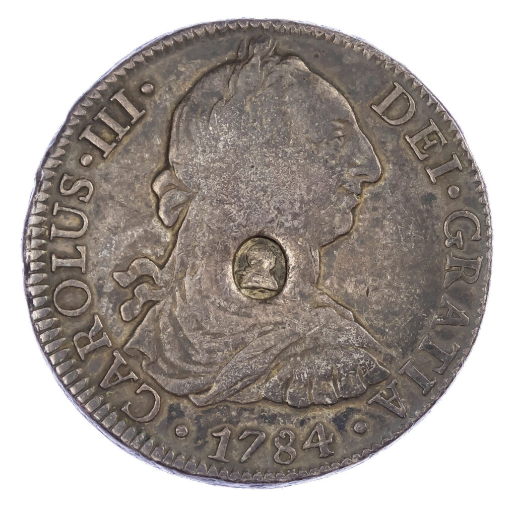 George III (1760-1820), oval countermark on Spanish Eight Reales ...